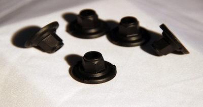 Self-tapping composite nut molded from polyamide