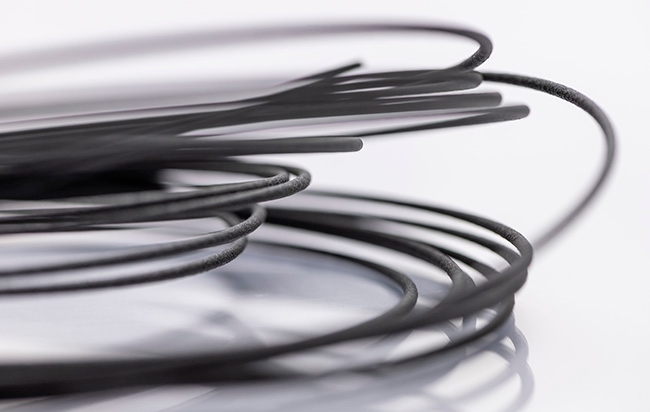 Carbon-fiber-reinforced PEEK for 3D-Printed Medical Implants