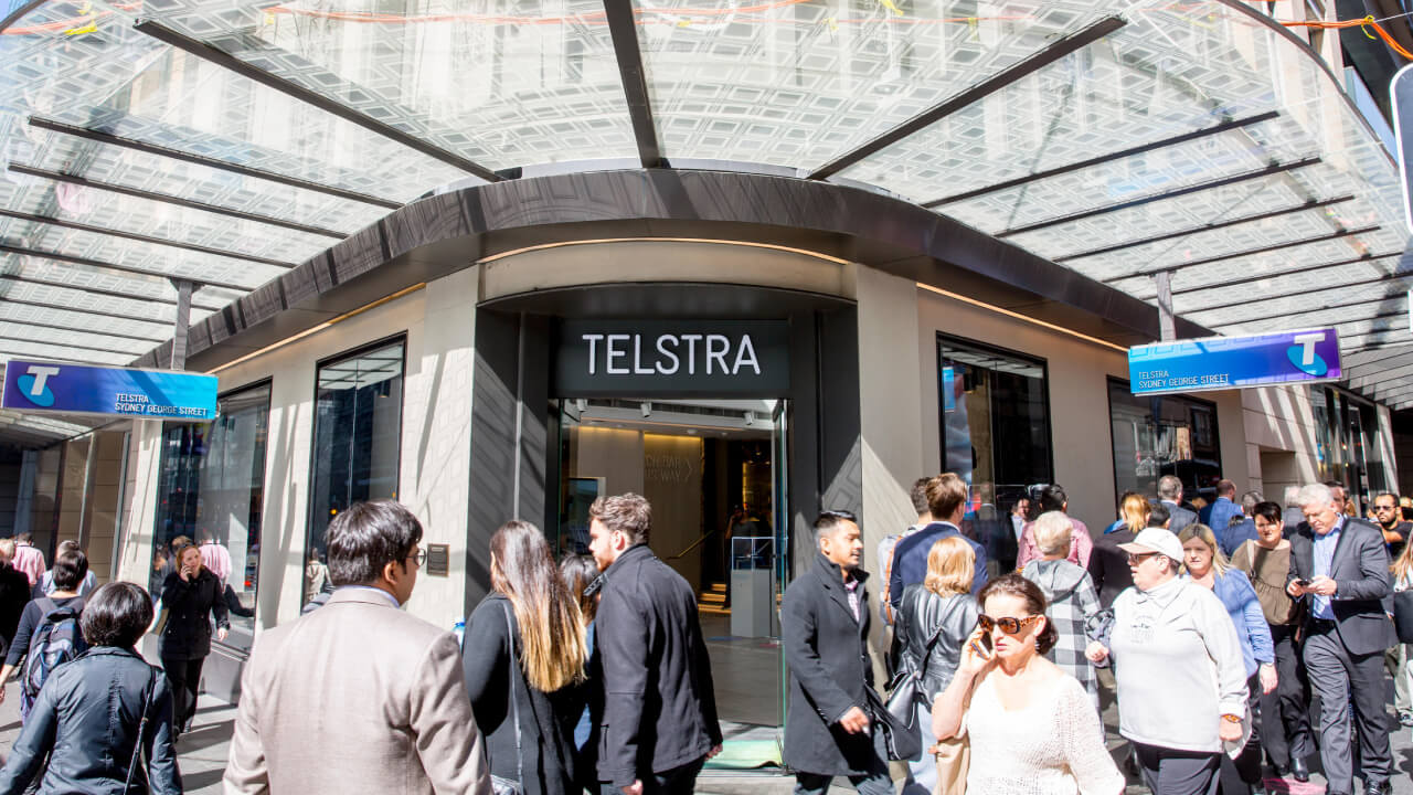 Telstra hikes profit by a third but stumbles in mobile race