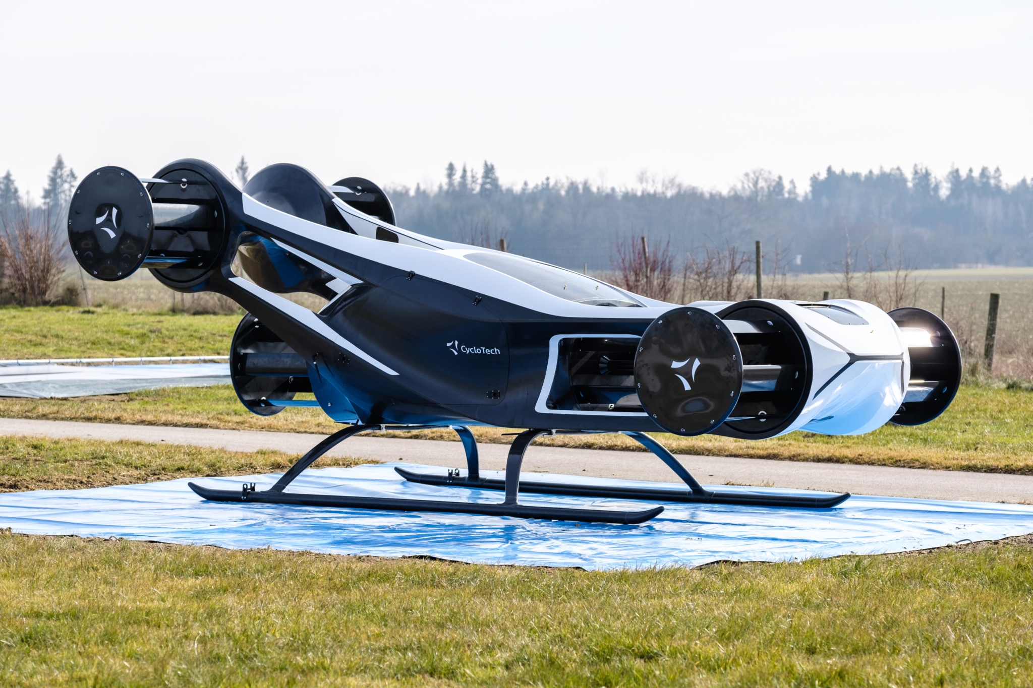 Electric Air Car Flies; CycloRotors, No Propellers, Mid-Air Braking