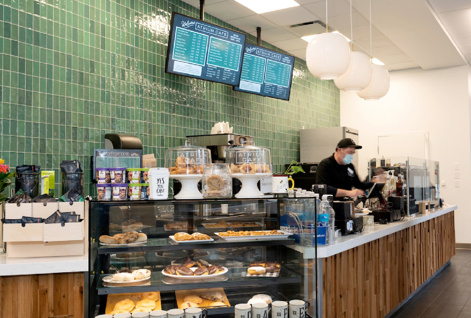 Renovated office tower café and market designed for new corporate ...