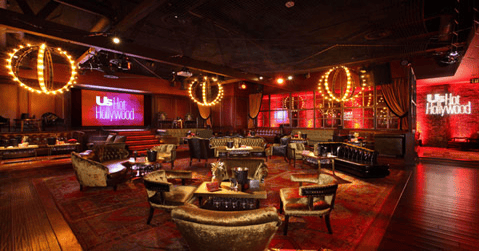 Us Weekly Takes to Voyeur With Scantily Clad Models, Burlesque Feel