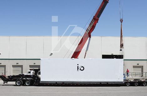 Citing Modular Demand, i/o Continues Expansion