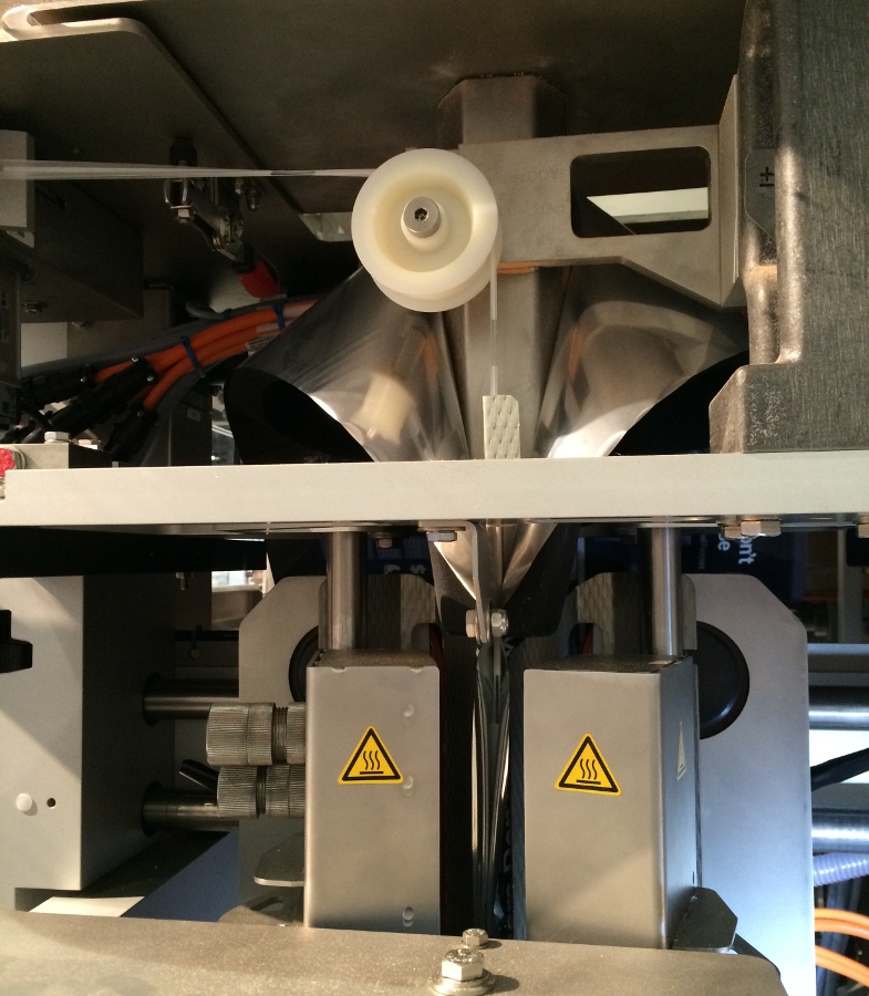 Vertical bagger makes Doyen-style pouches in a much smaller footprint