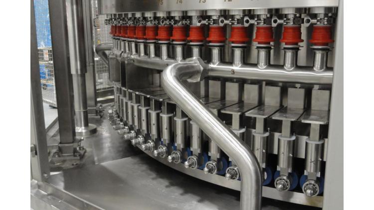 Advanced controls improve high-speed milk bottling and capping