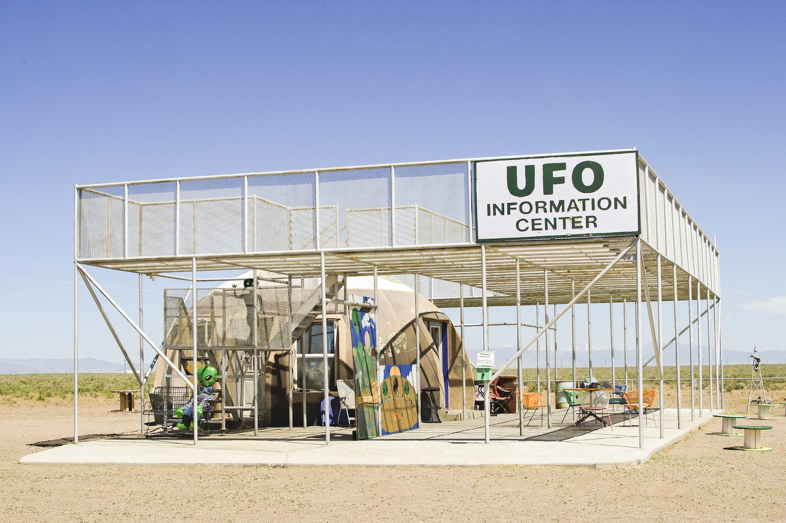A building with a sign reading "UFO Information Center" located at the ...