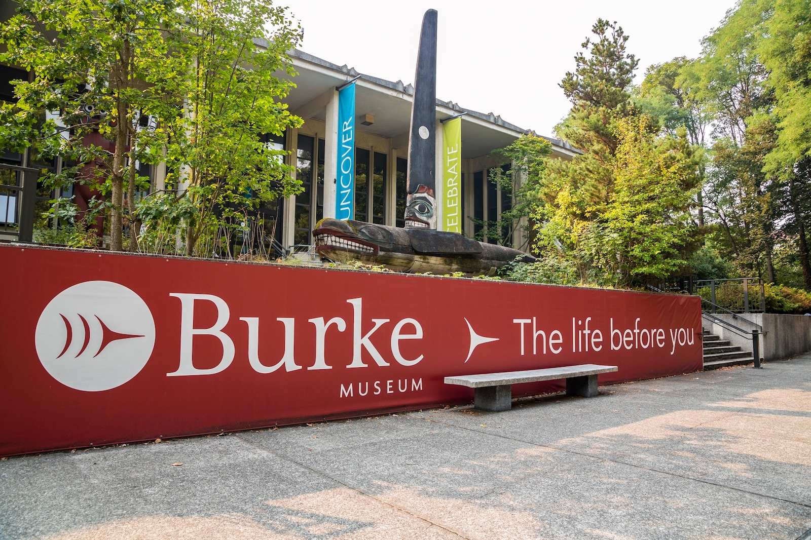A sign displaying "Burke Museum" at the entrance of the Burke Museum of ...