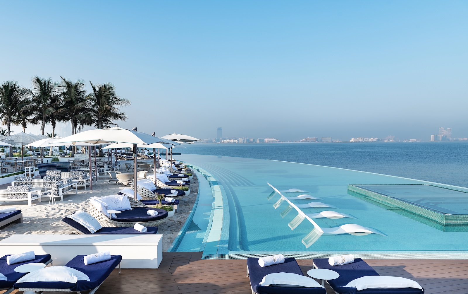 The light-blue waters of the stunning infinity pool at Jumeirah Burj Al ...