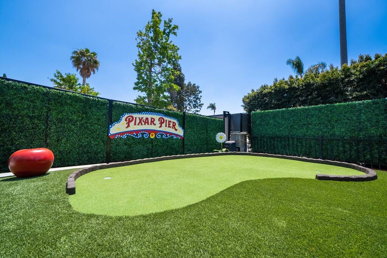A serene putting green at Pixar Paradise in Garden Grove, surrounded by ...