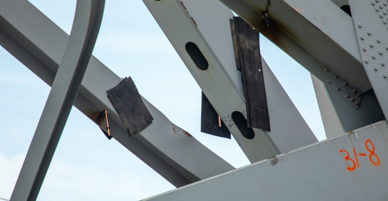 Explosive charges set to bring down Key Bridge section