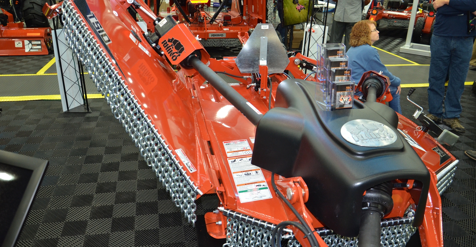 Flex-wing mower designed with utility tractor in mind