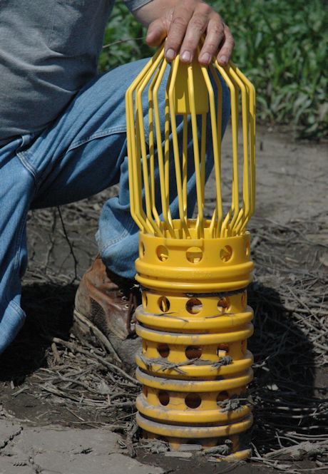 Installing drainage tile puts farmer in field faster