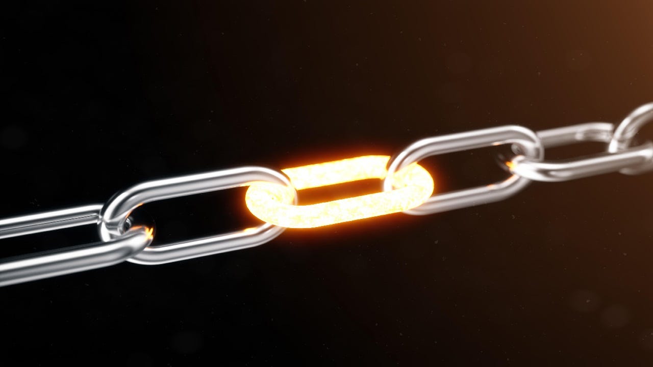 C metal chain with a glowing link in the middle C metal chain with a glowing link in the middle