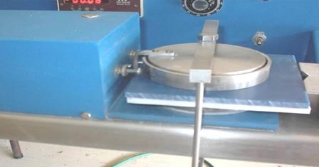 How Wall Friction Affects Hopper Angles