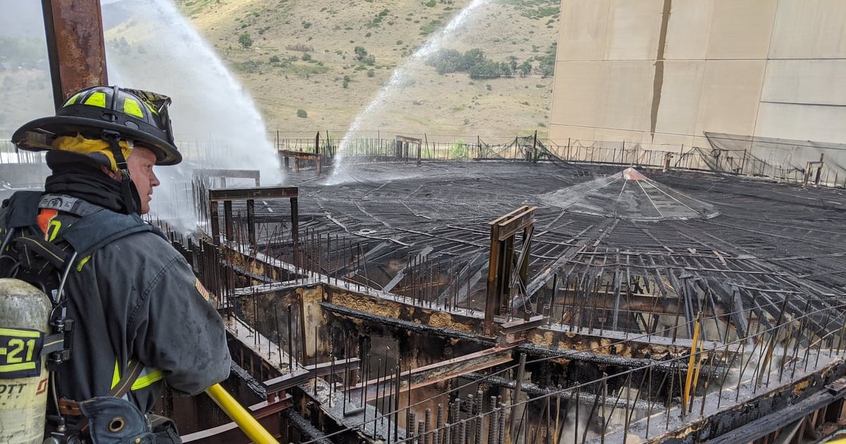 Crews Battle Fire Atop Malt Silo at Coors Brewery